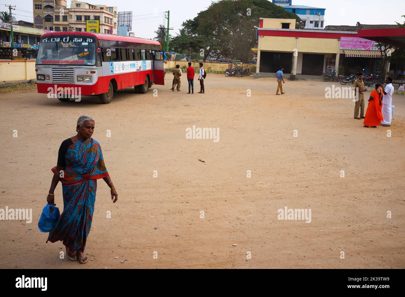 A dusty bus station with vintage bus in India Stock Photo - Alamy