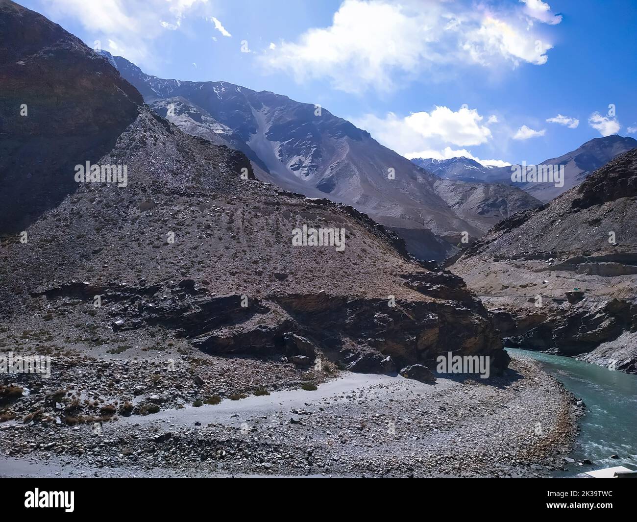 A beautiful shot of a mountain valley beside the Indus River in India ...