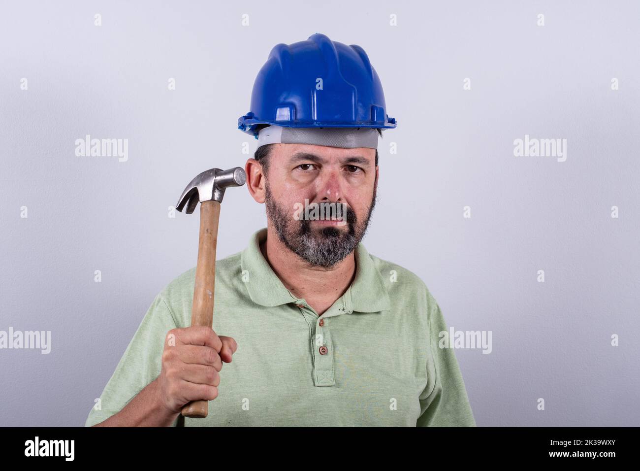Portrait of 60 years old professional heavy industry engineer/worker ...