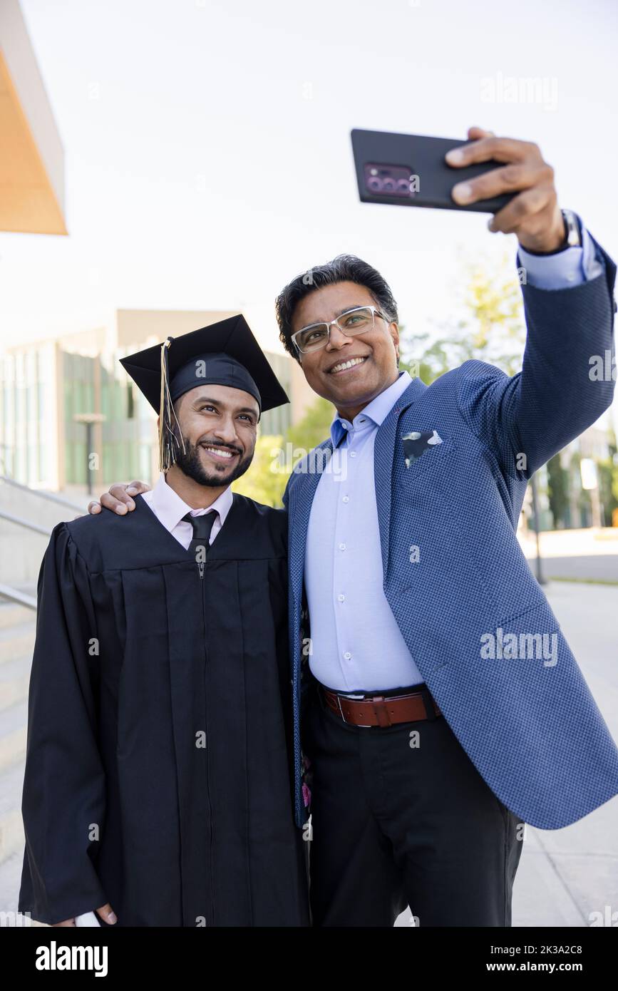Asian graduate father son hi-res stock photography and images - Alamy