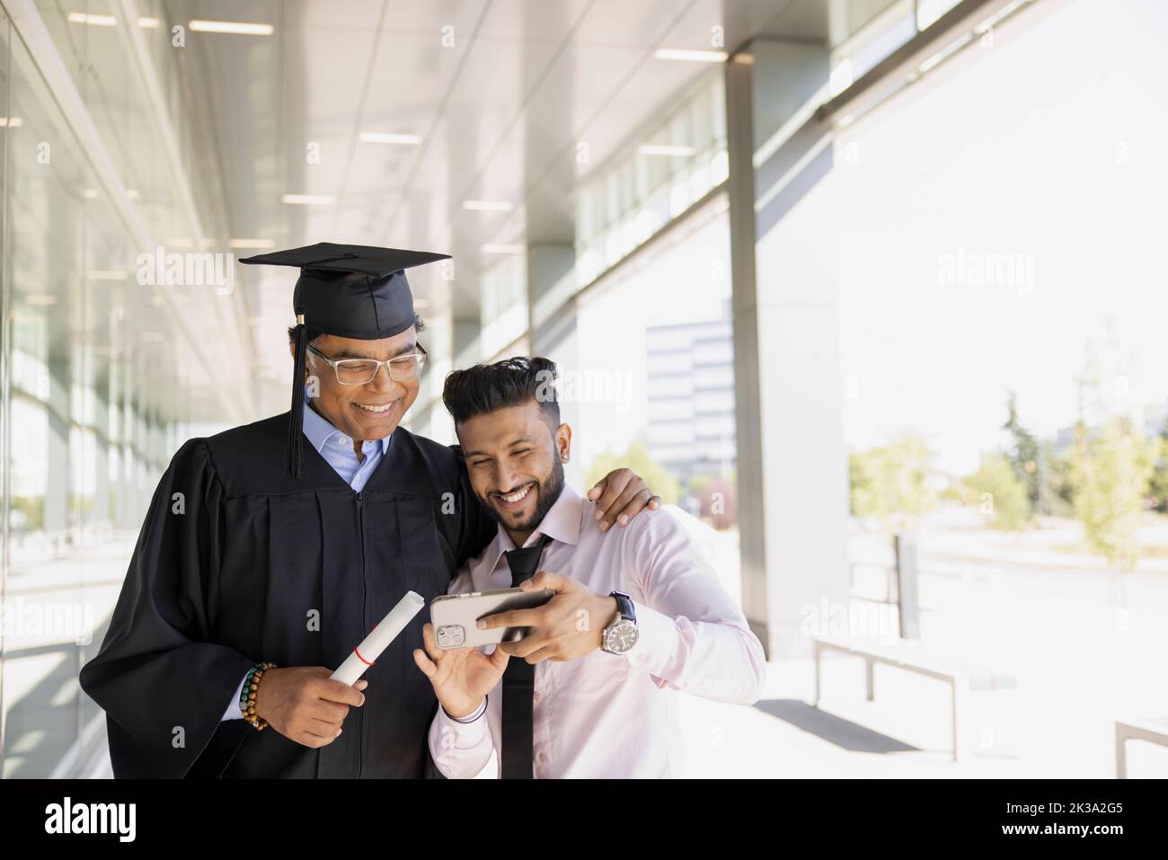 Asian graduate father son hi-res stock photography and images - Alamy