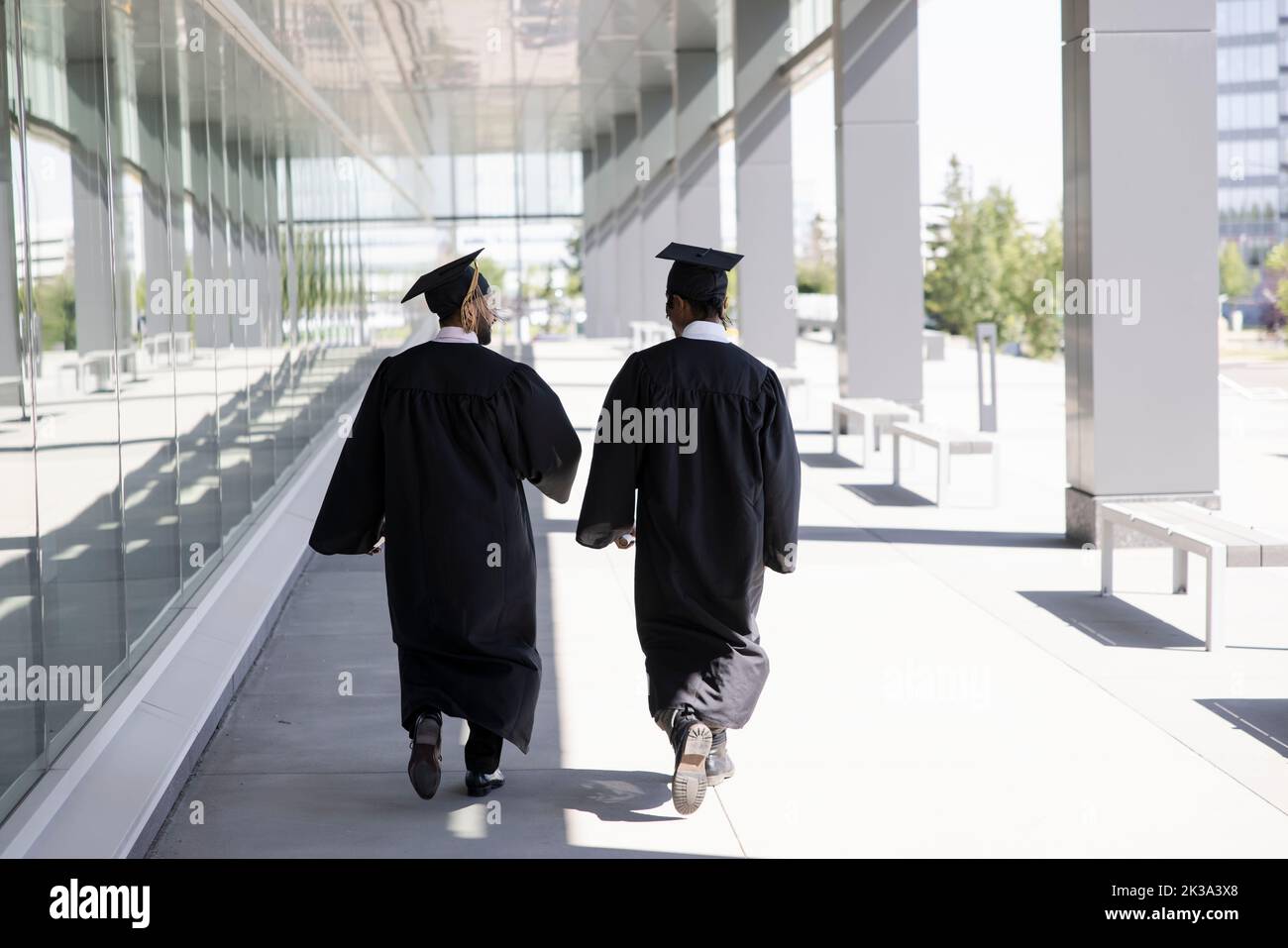 Male student walking campus hi-res stock photography and images - Alamy