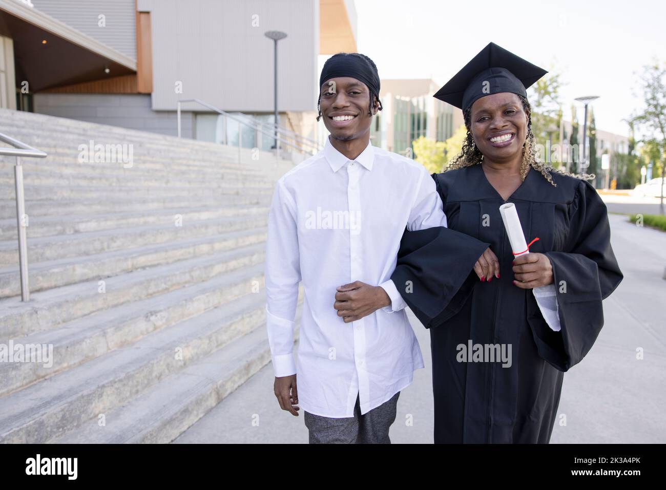 Happy african college graduate looking hi-res stock photography and ...