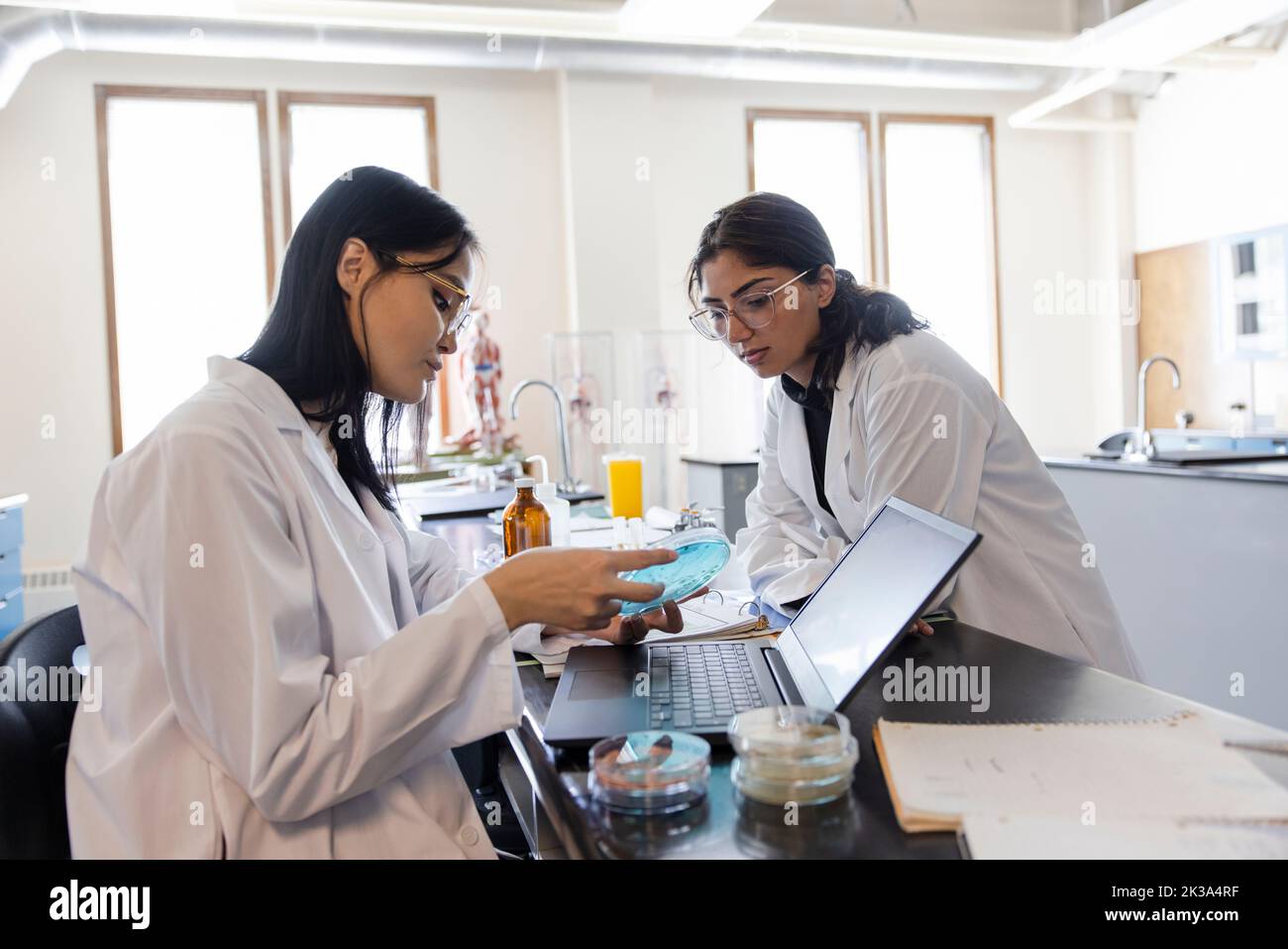 Female lab coat equipment hi-res stock photography and images - Alamy