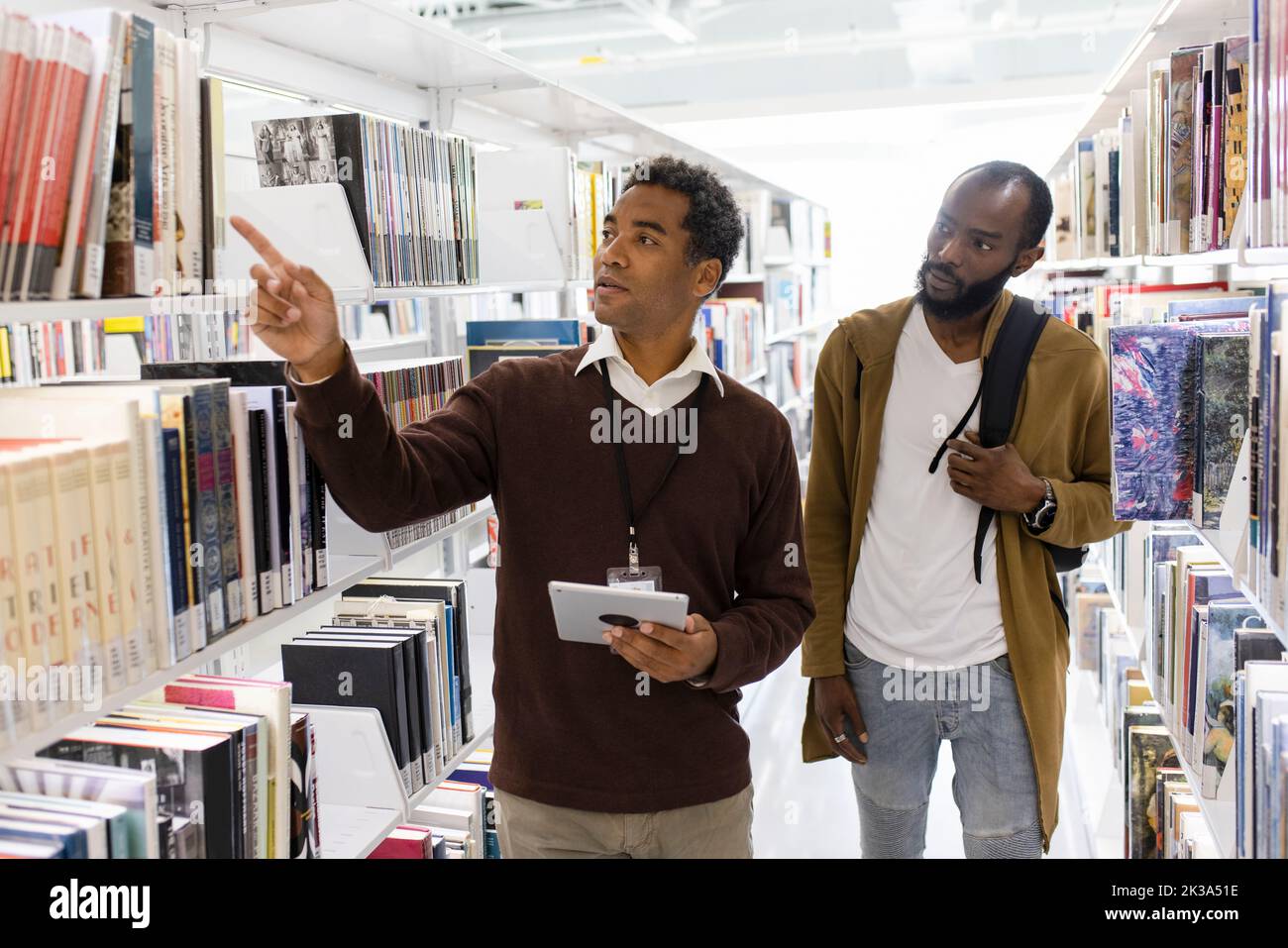 Male librarian book hi-res stock photography and images - Alamy