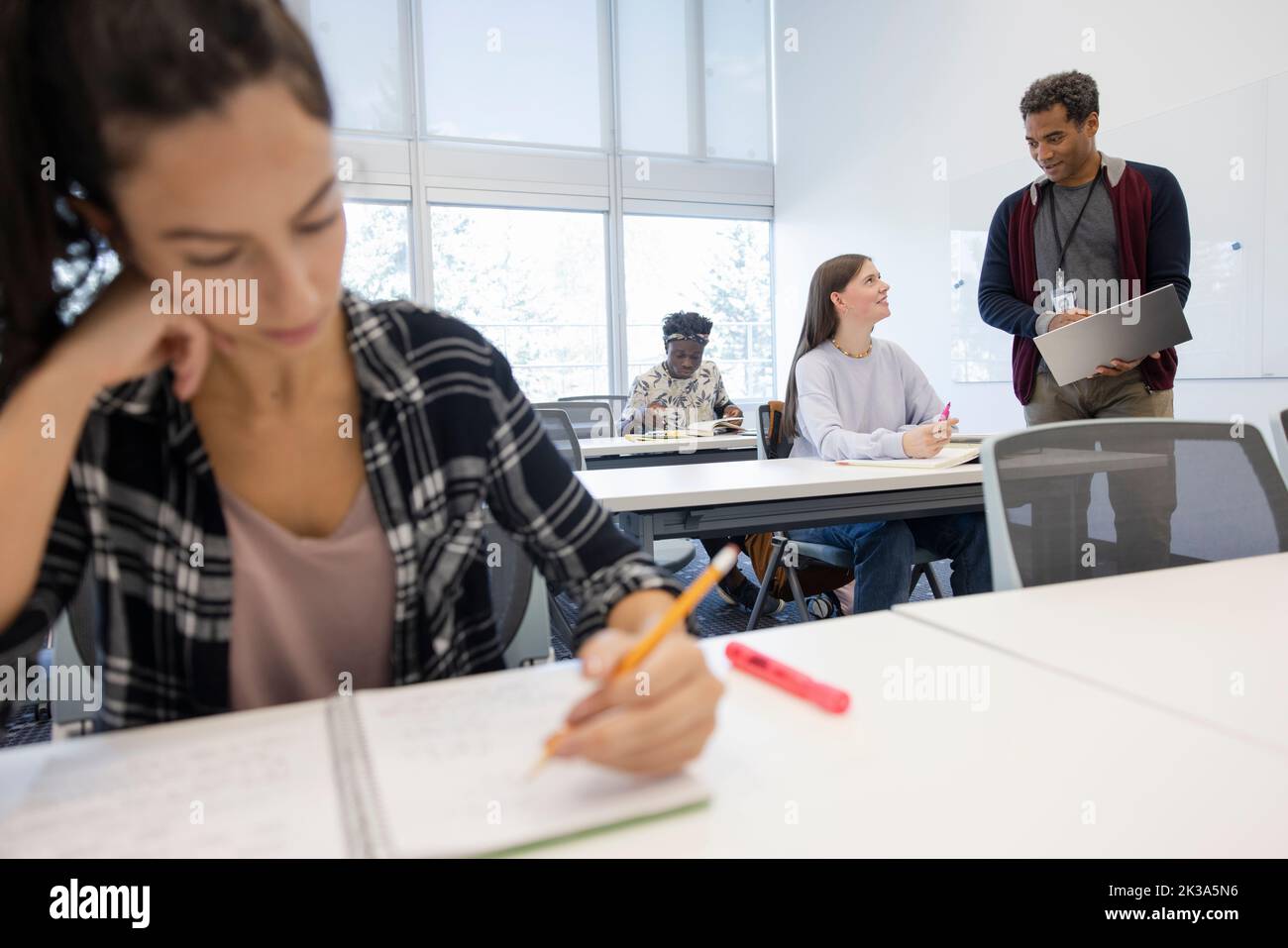 Talking front of classroom hi-res stock photography and images - Alamy