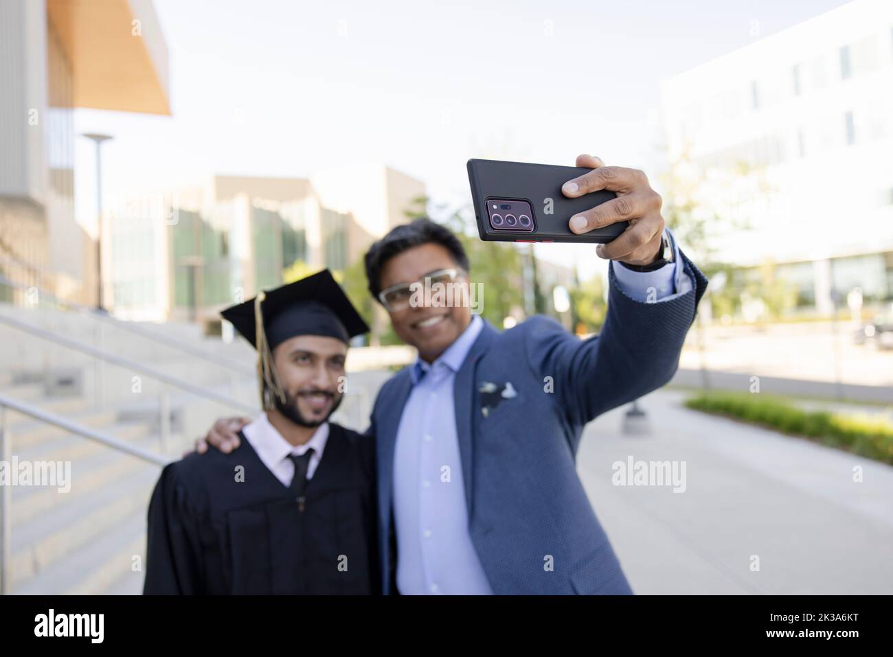 Asian graduate father son hi-res stock photography and images - Alamy