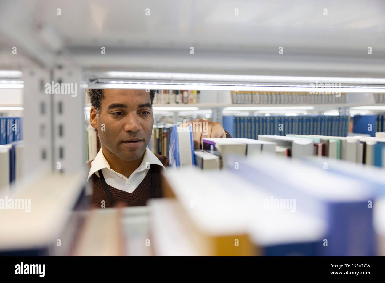 Male librarian book hi-res stock photography and images - Alamy