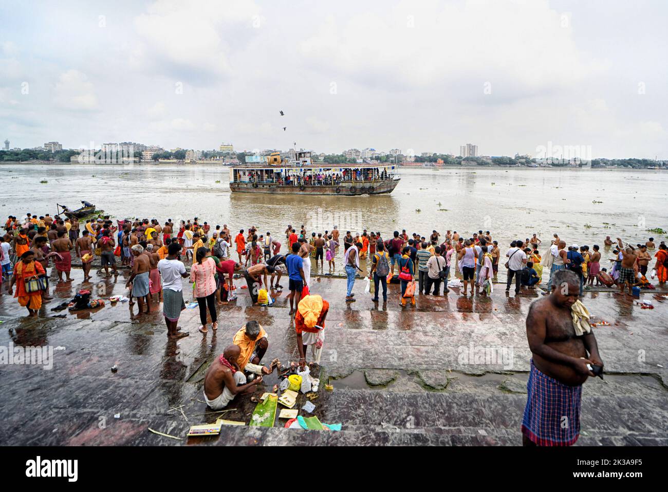 Kolkata, India. 25th Sep, 2022. Devotees seen in The River Ganges ...