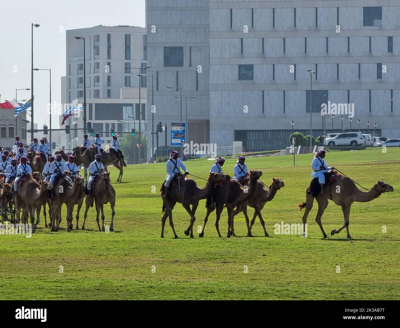 Police on camel in traditional clothes in Doha, Qatar. Doha has a ...