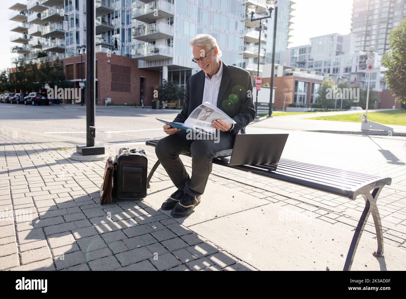 Bench on the street hi-res stock photography and images - Alamy