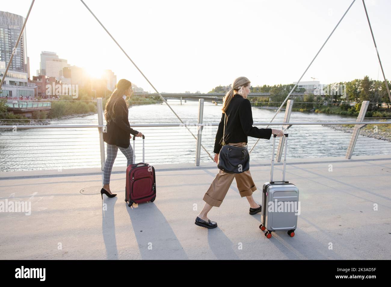 People walking over bridge hi-res stock photography and images - Alamy