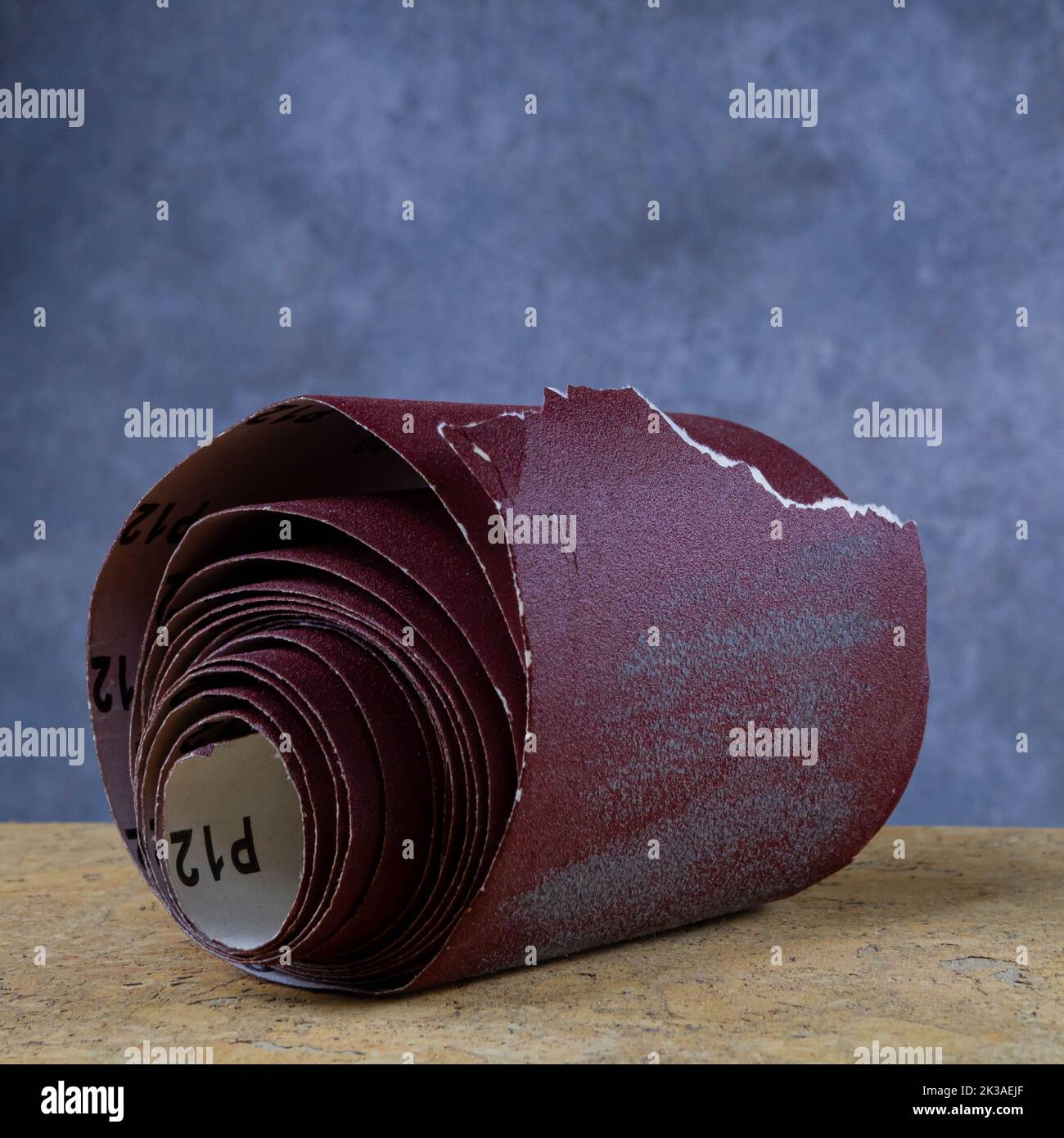 Roll of sandpaper. Wood grinding paper. High-quality photo. Tools for ...