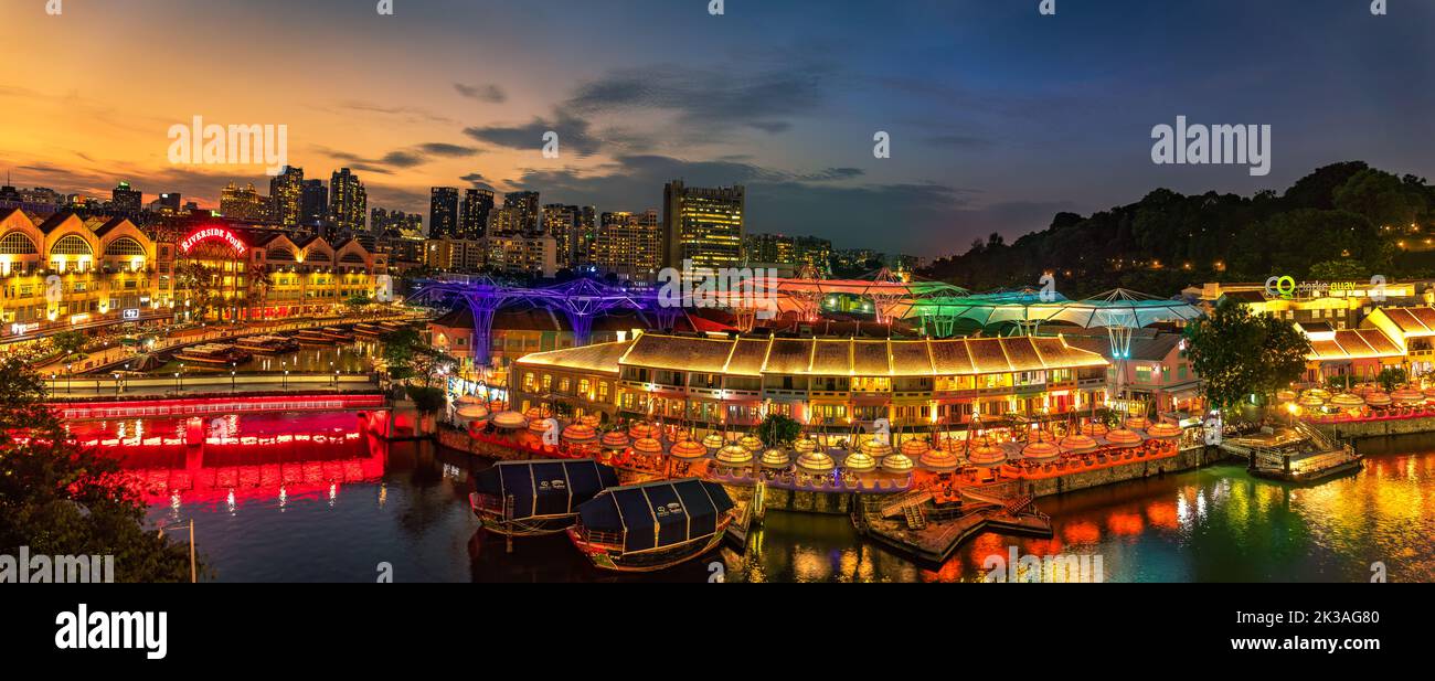Scenic nightscape of Riverside Point, Clarke Quay with Bumboat cruising ...