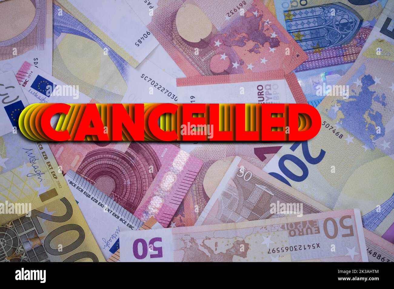 Cancelled word with money. Paper currency background with different ...