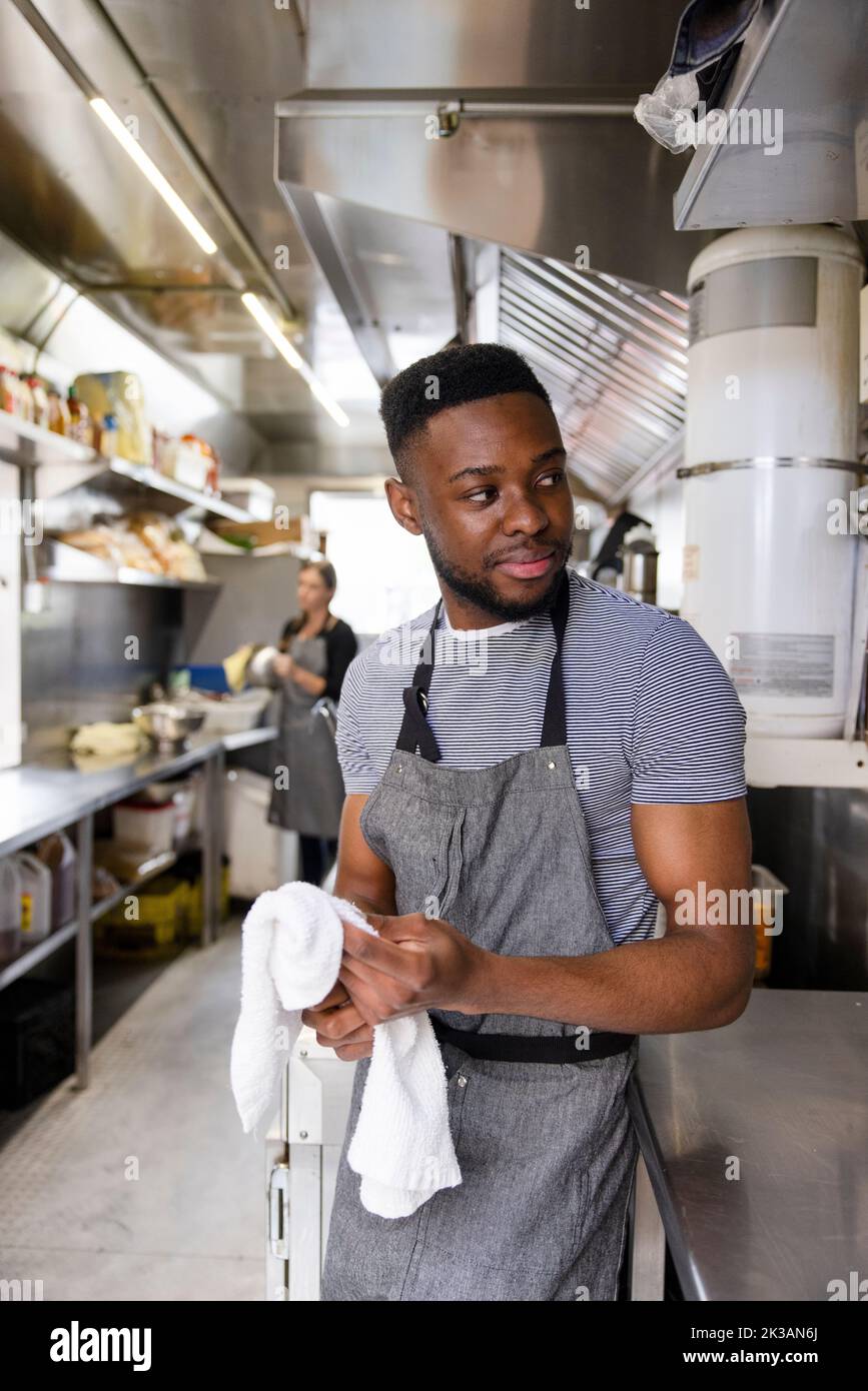 Retail young worker hi-res stock photography and images - Alamy
