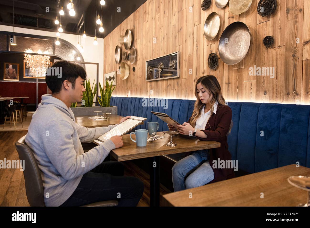 Man menu restaurant looking hi-res stock photography and images - Alamy