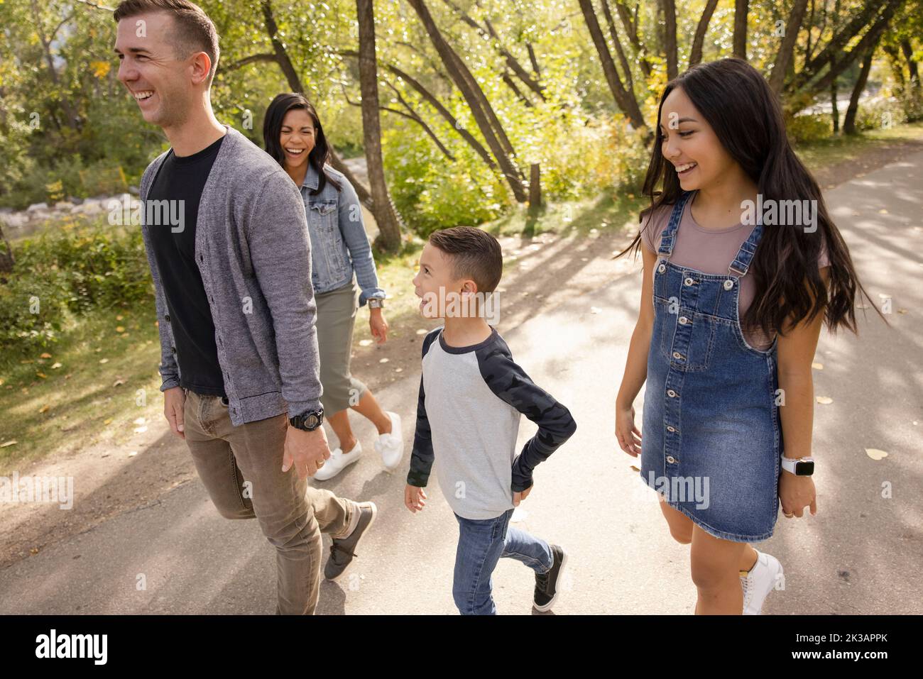 Happy asian family walking outdoors hi-res stock photography and images ...