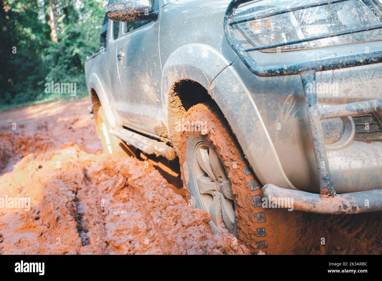 Off-road tires, Dirty offroad car, SUV covered with mud on countryside ...