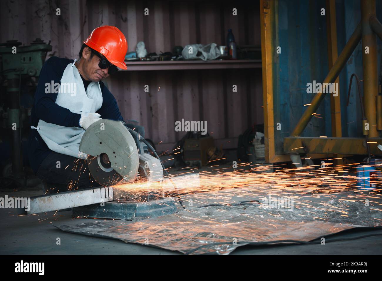 Cutting of a steel with splashes of sparks in the industrial shop Stock ...