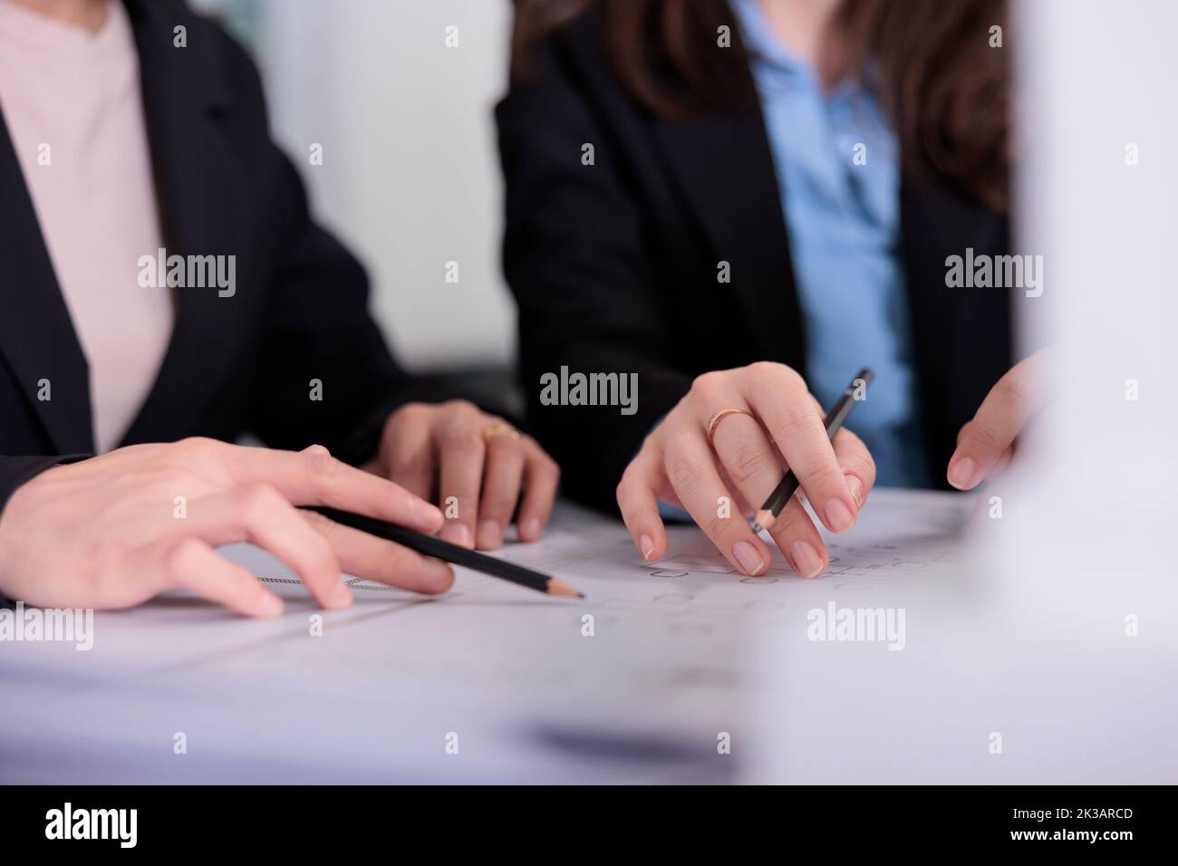 Architects working on cad project, designers hands with pencils on ...