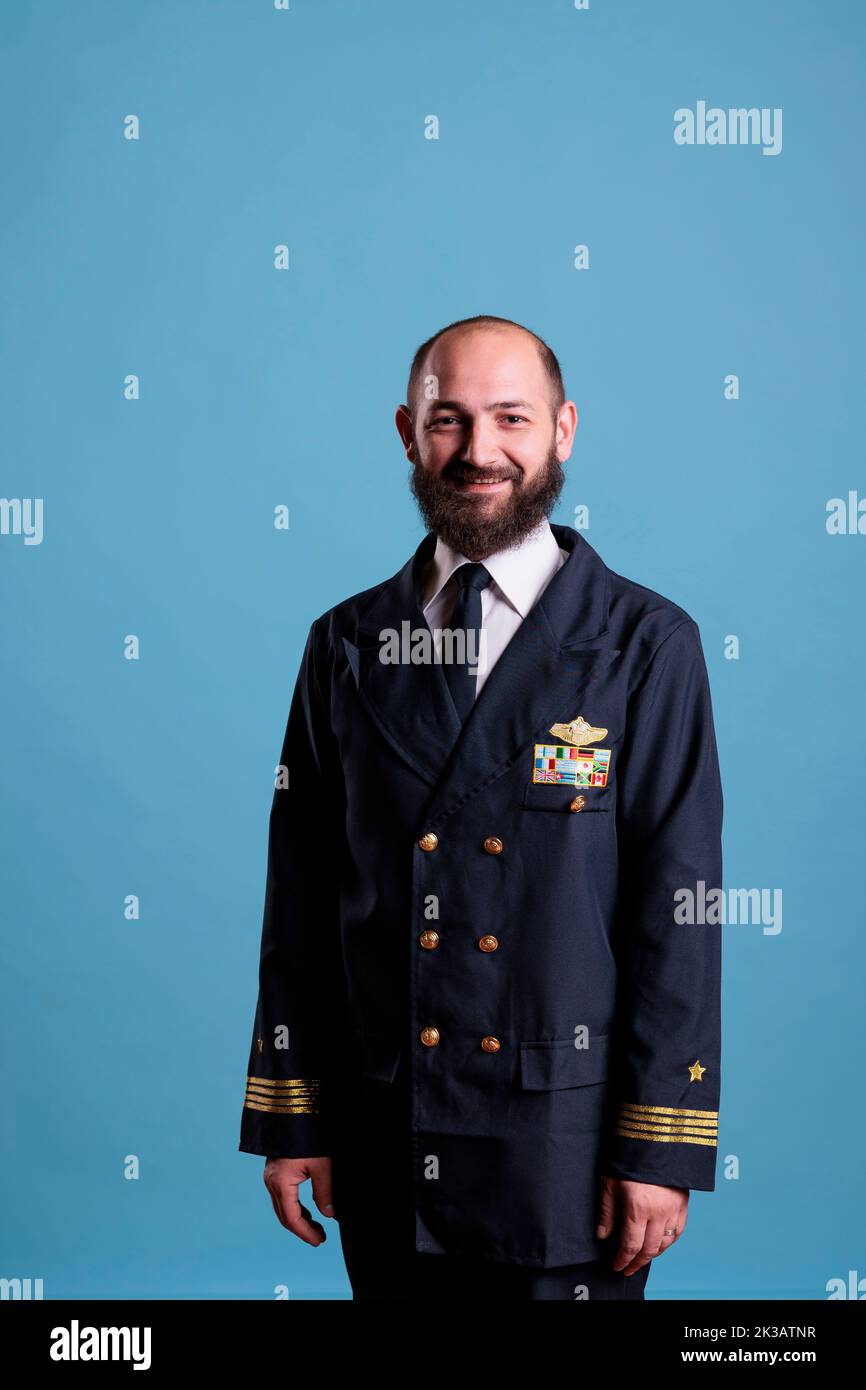 Airplane captain wearing uniform portrait, confident plane captain ...