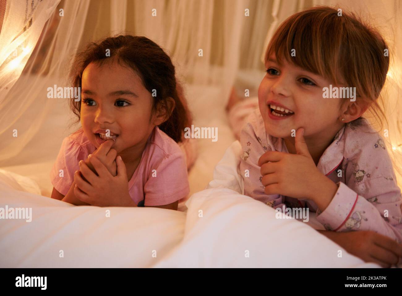 I LOVE sleepovers. two cute little girls having a sleepover Stock Photo ...