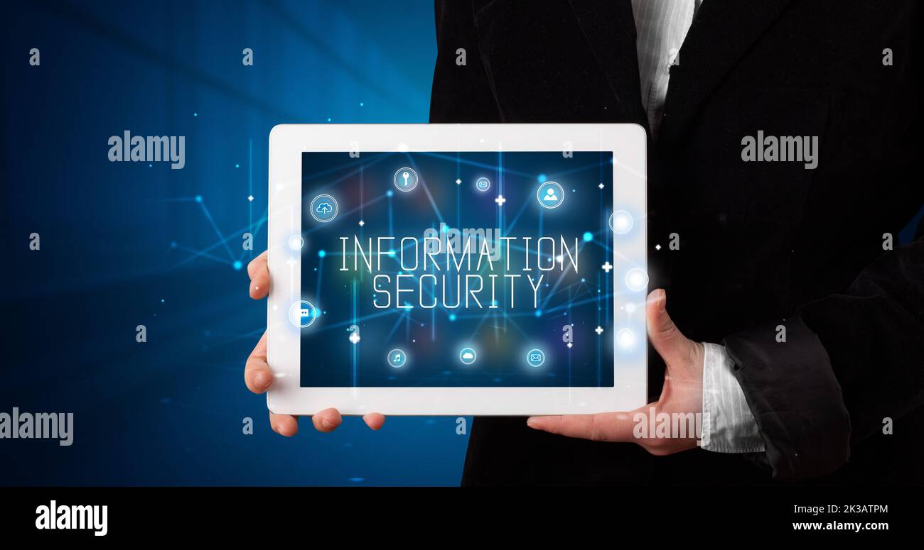Person holding tablet, security concept Stock Photo - Alamy