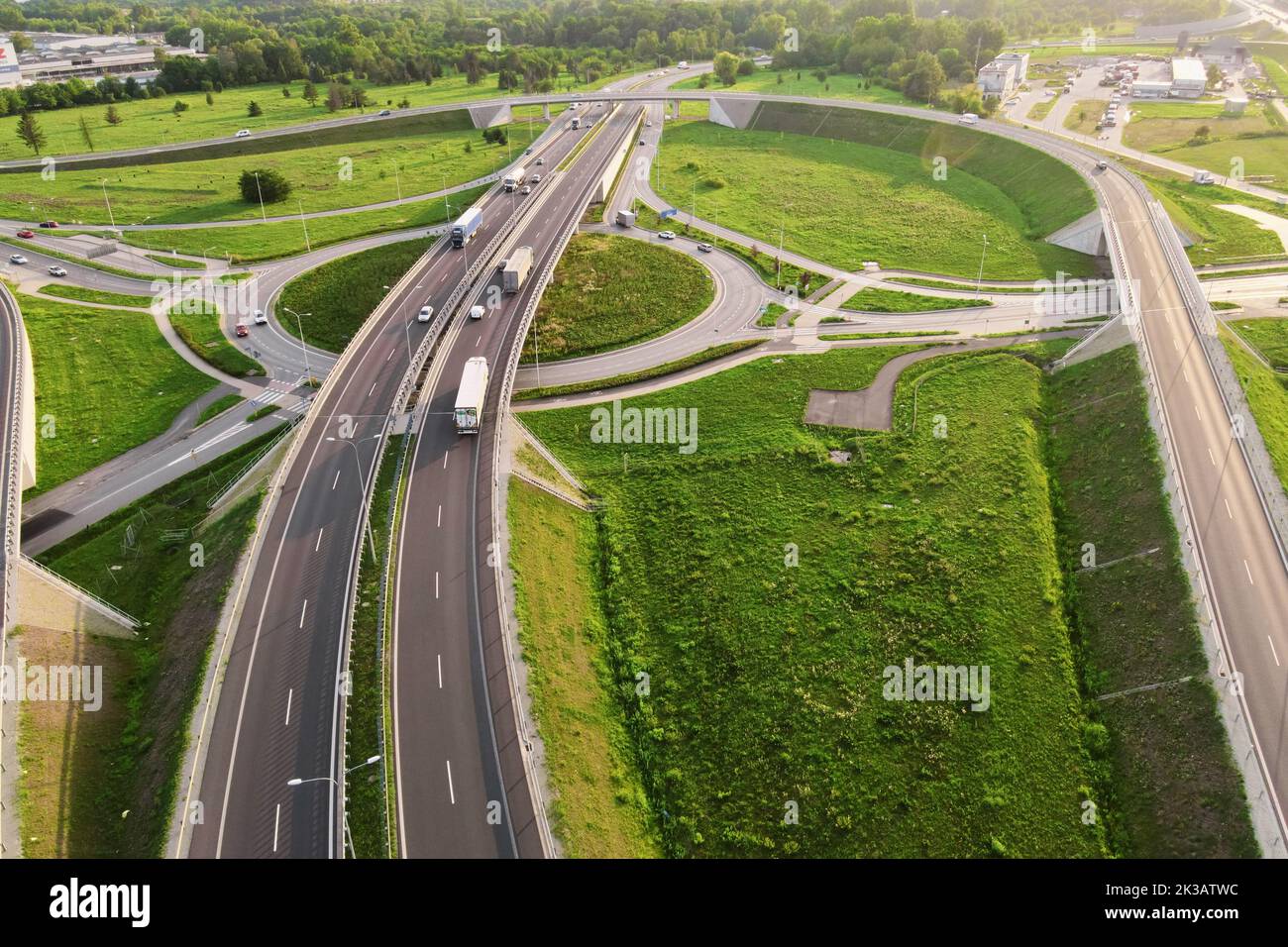 Aerial view of cars driving on round intersection in city ...