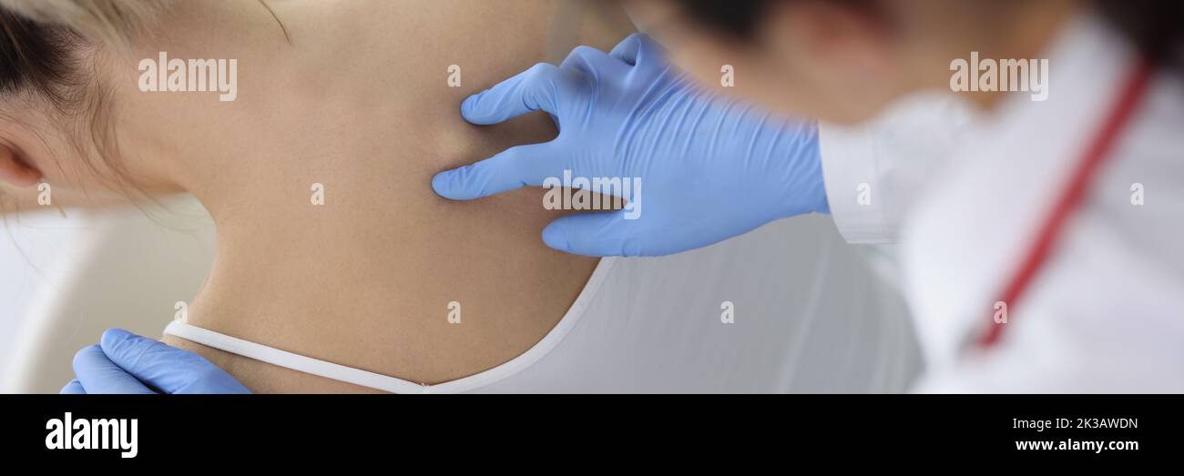 Chiropractor doctor presses on a woman's spine Stock Photo - Alamy