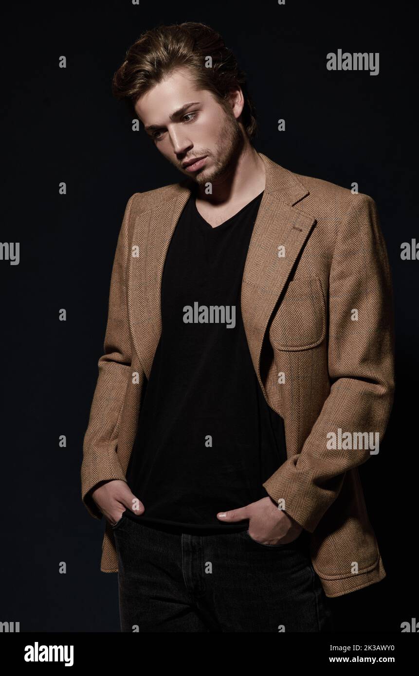Young black male model posing hi-res stock photography and images - Alamy