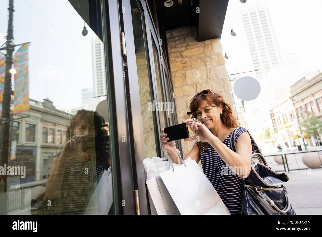 Shop reflection in window city hi-res stock photography and images - Alamy