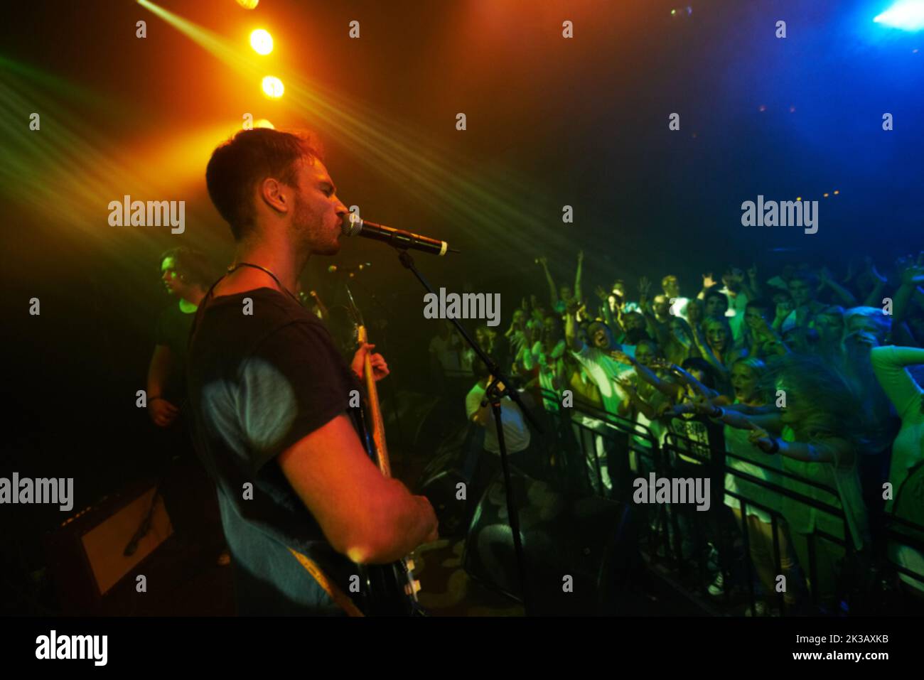 A band playing on stage at a concert- This concert was created for the ...