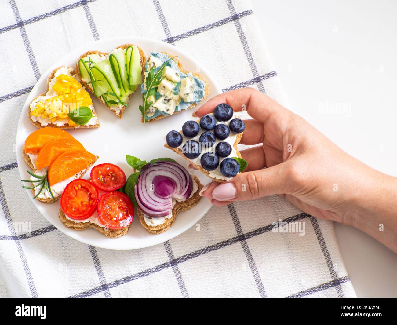 Rainbow sandwiches heart shape. Breakfast bread rainbow sandwiches with ...