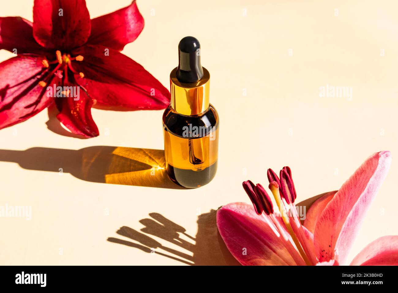 amber cosmetic bottle with a pipette on a beige background. anti-aging ...