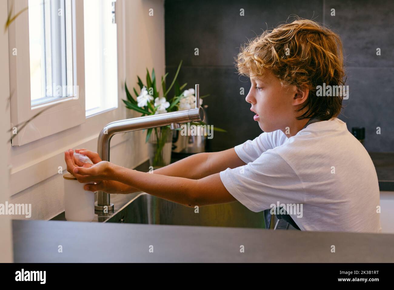 Boy soap dispenser hi-res stock photography and images - Alamy