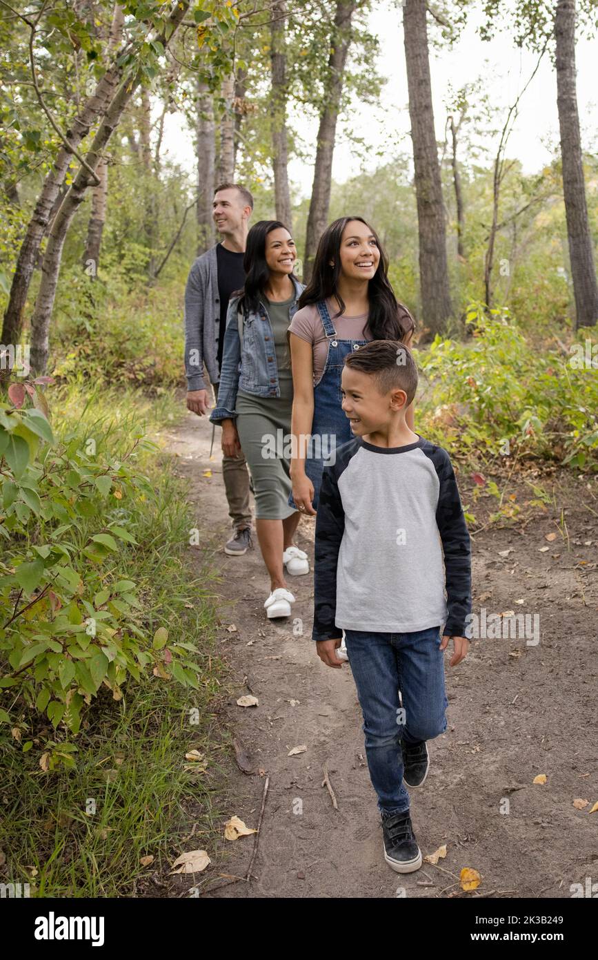 Happy asian family walking outdoors hi-res stock photography and images ...