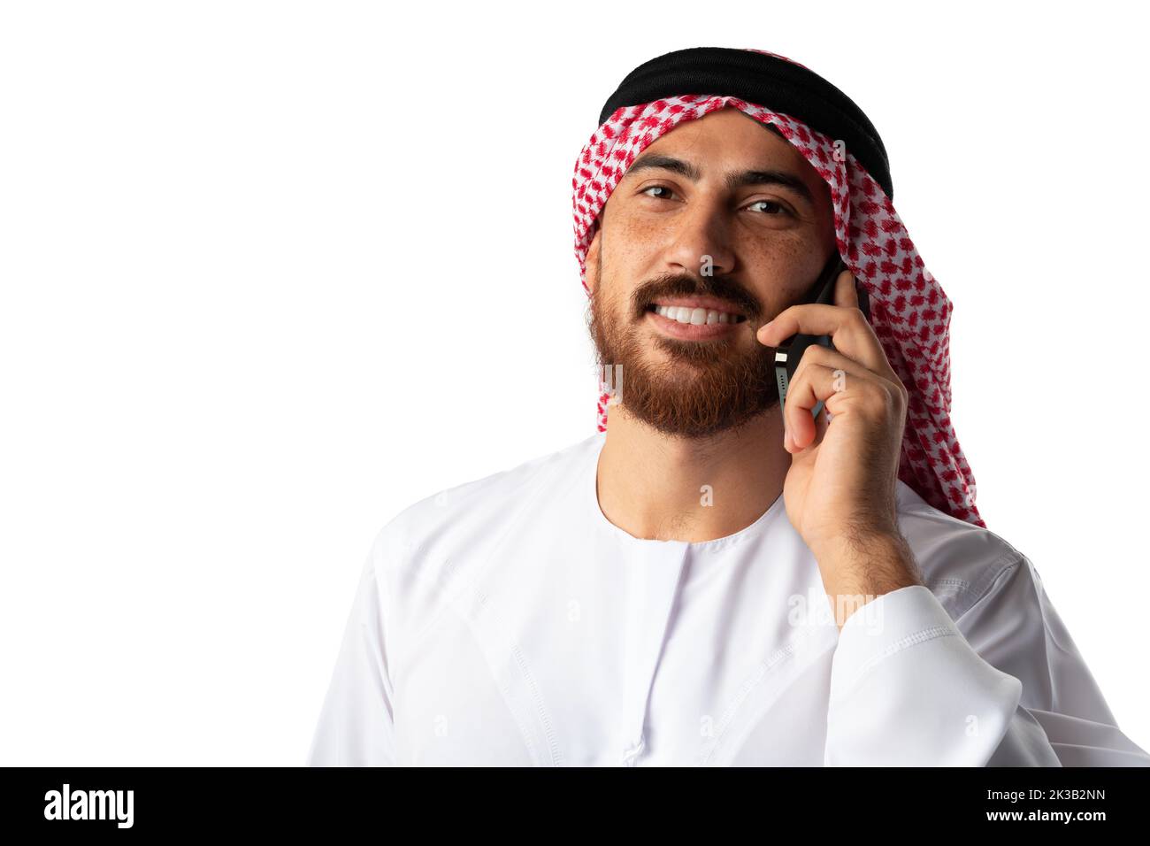 Arab businessman talking on mobile phone isolated on white background ...
