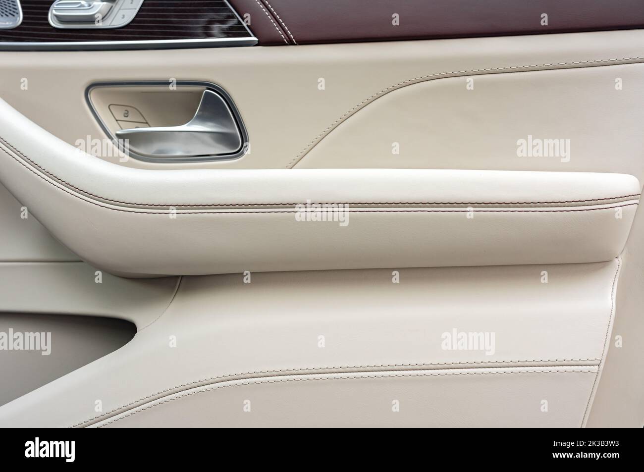Front handle door panel with buttons of a luxury car Stock Photo - Alamy