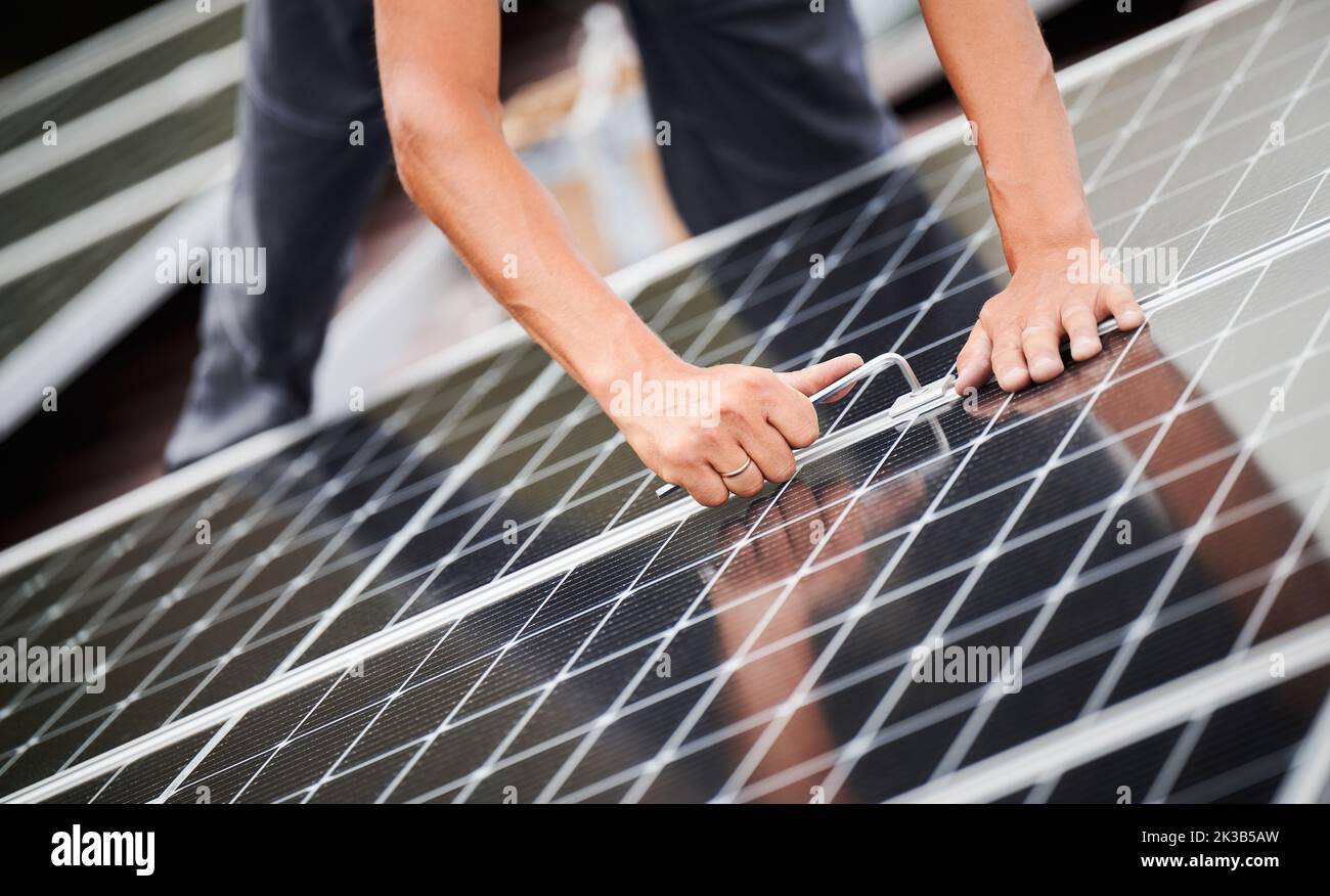 Worker tightening solar panel hi-res stock photography and images - Alamy