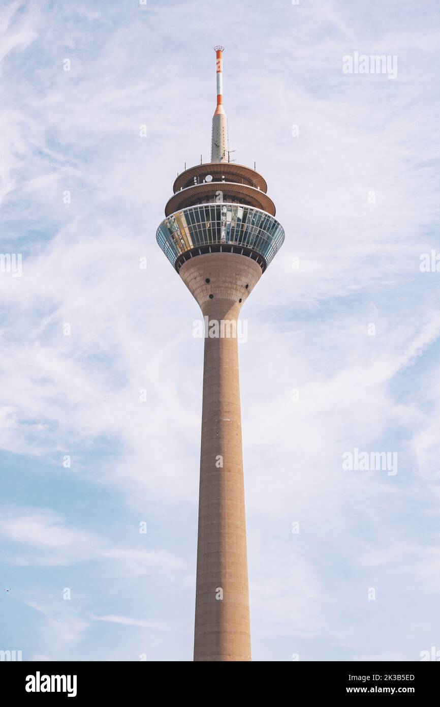 Low angle view of incredibly high and tall Rheinturm Tv Tower - is a ...