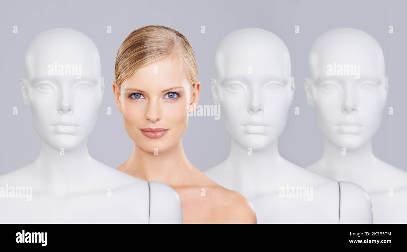 Dont be another face in the crowd. A beautiful young woman standing ...