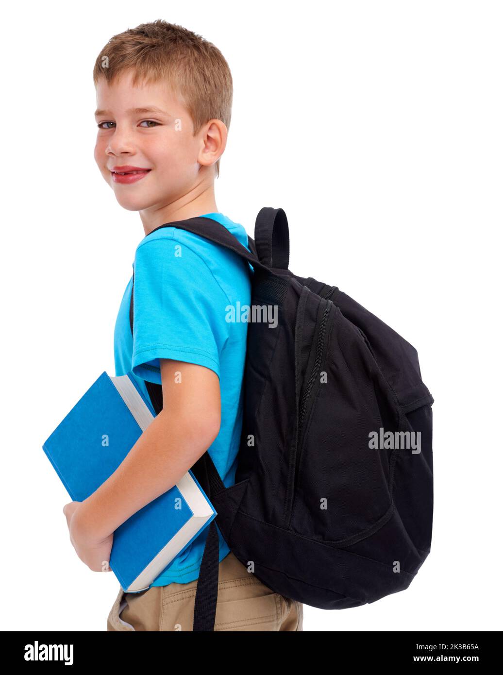 I like studying hard. Studio shot of a cute young elementary student ...