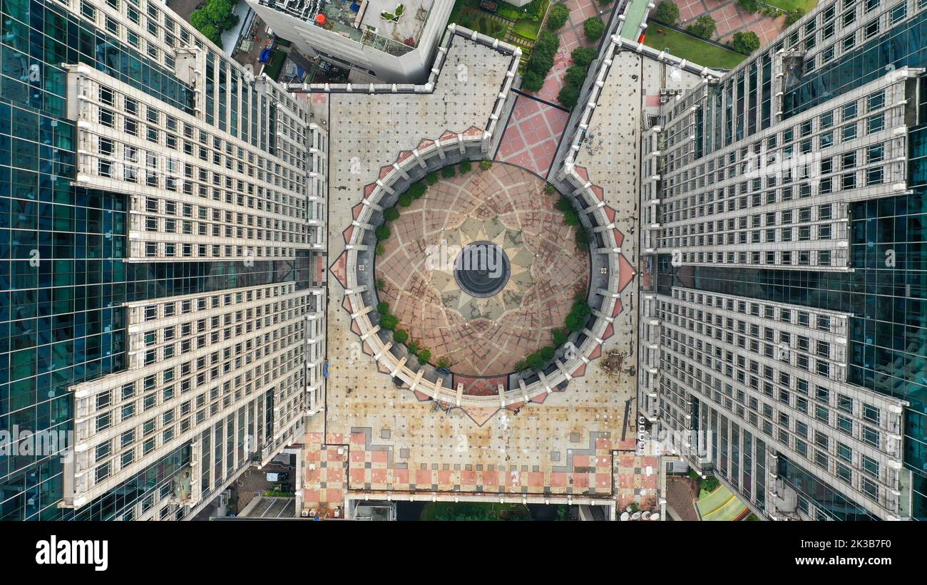 aerial top down view of a courtyard between two high rise buildings ...