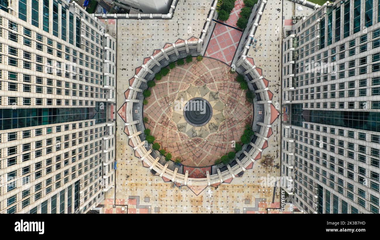 aerial top down view of a courtyard between two high rise buildings ...