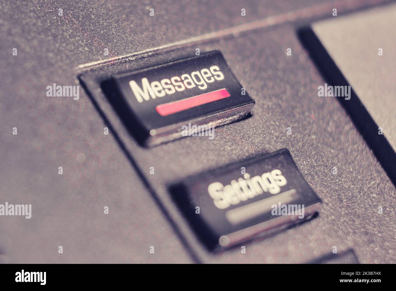 A button with a message text and setup on a landline phone in the ...