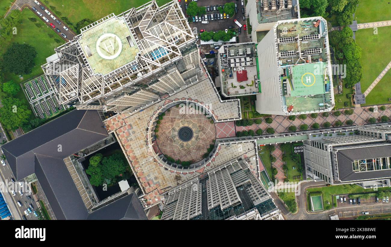 aerial top down view of a courtyard between two high rise buildings ...