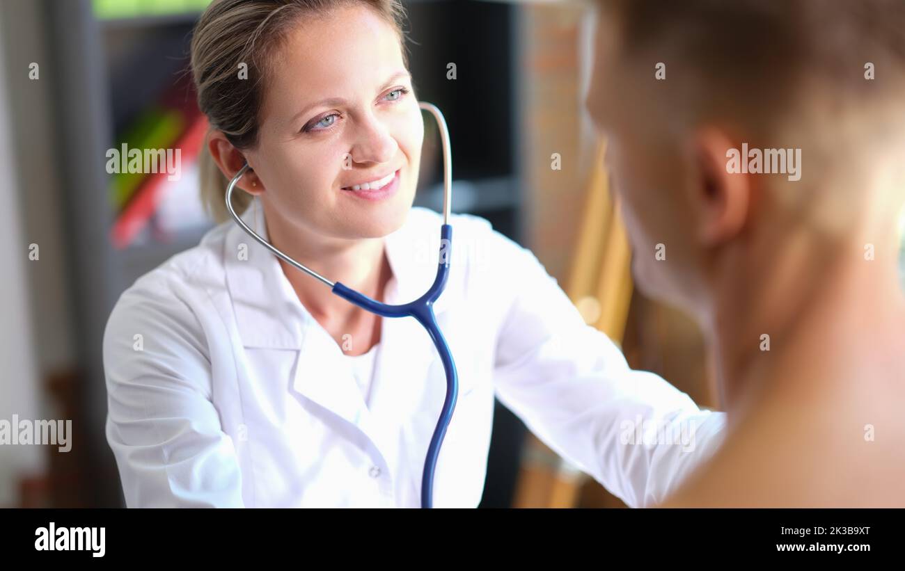 Nurse listening chest patient stethoscope hi-res stock photography and ...