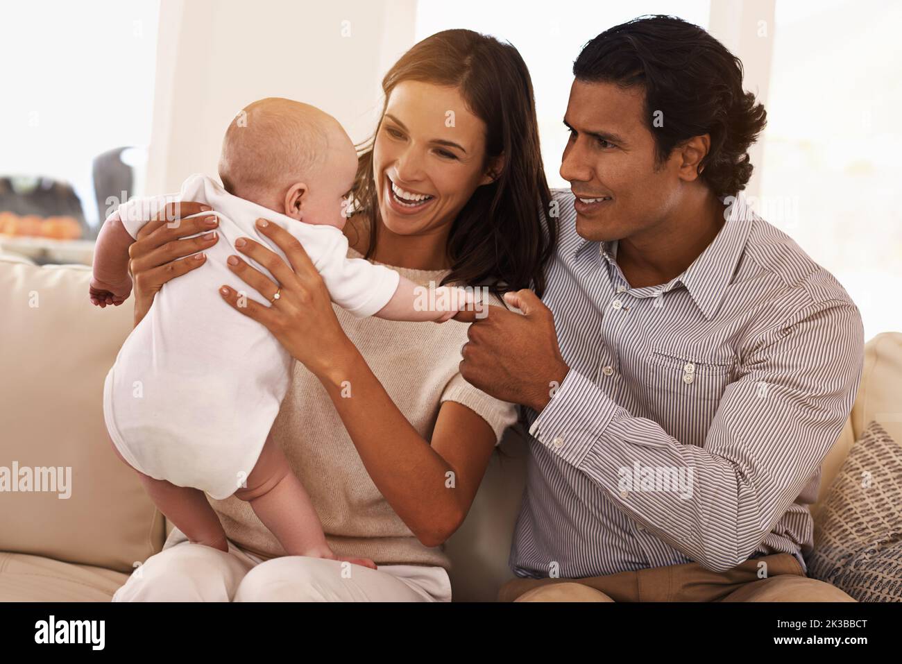 The newest addition to the family. an affectionate couple and their ...