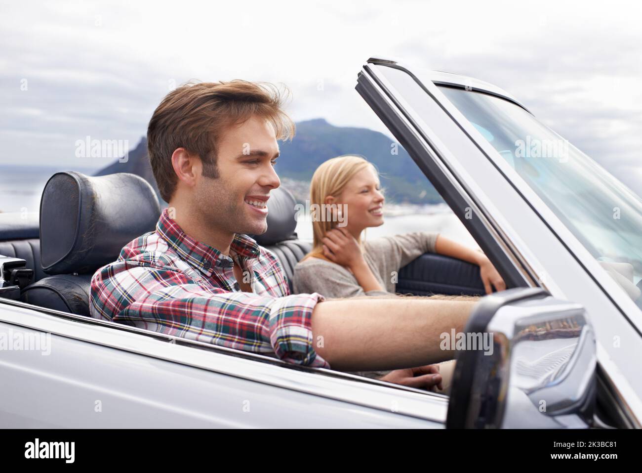 Young couple driving a convertible car hi-res stock photography and ...